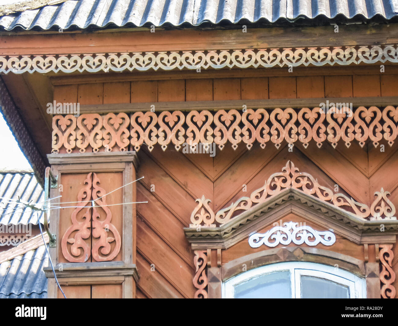 Plinths of windows of wooden houses. Ancient style of decoration of ...