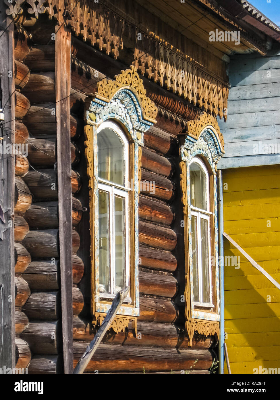 Plinths of windows of wooden houses. Ancient style of decoration of ...