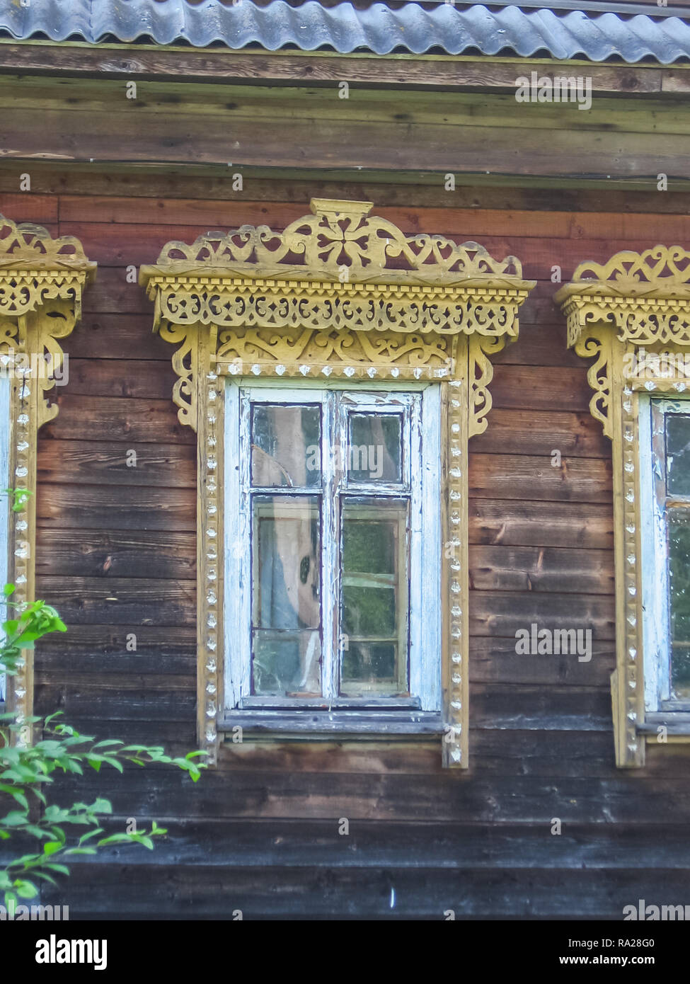 Plinths of windows of wooden houses. Ancient style of decoration of ...
