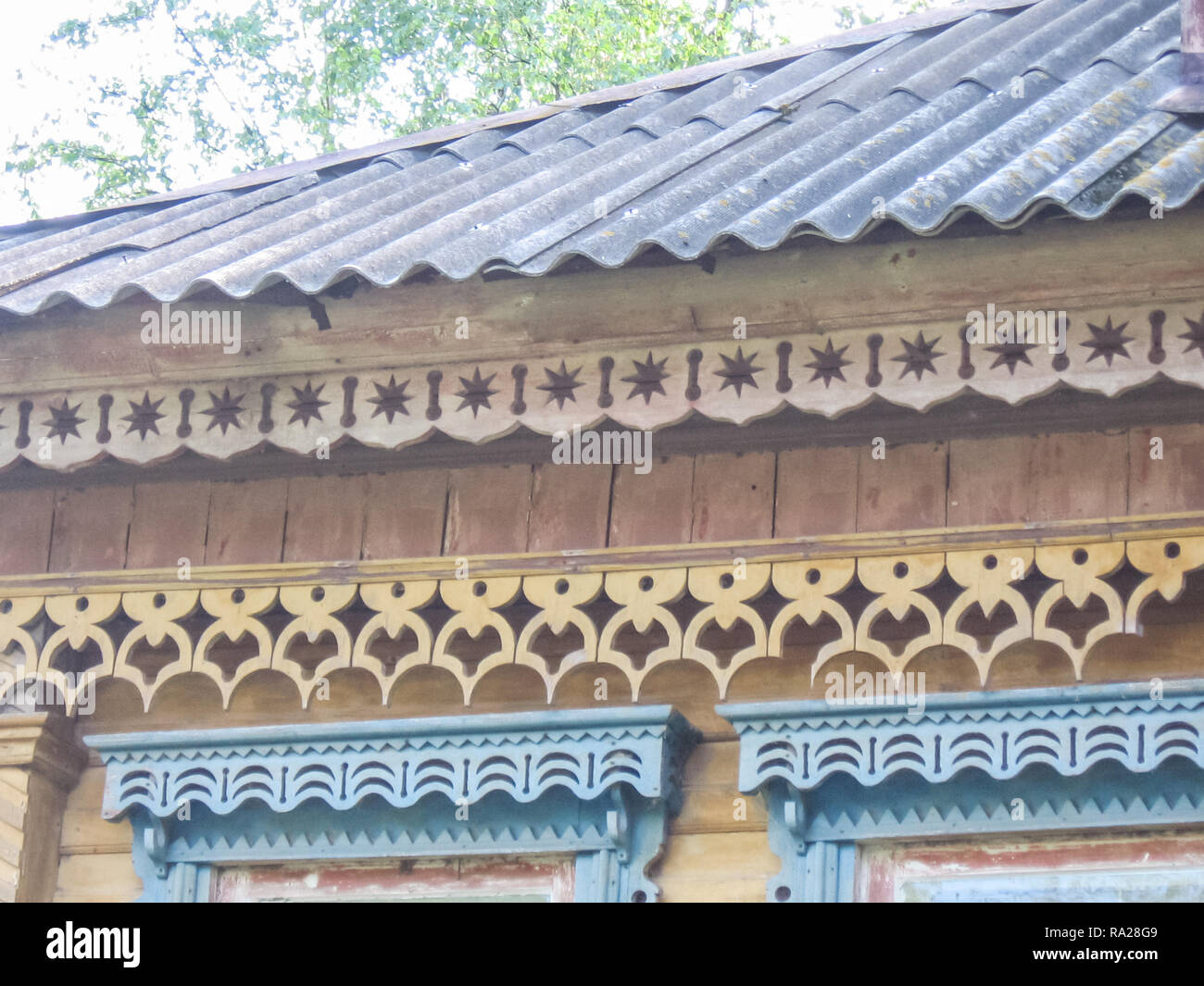 Plinths of windows of wooden houses. Ancient style of decoration of ...