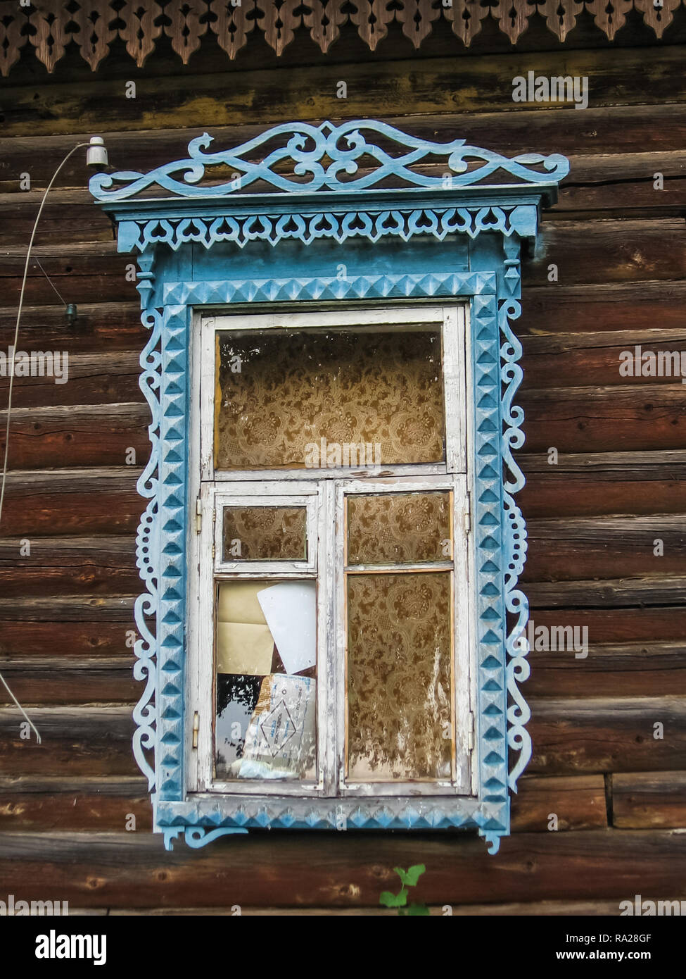 Plinths of windows of wooden houses. Ancient style of decoration of ...
