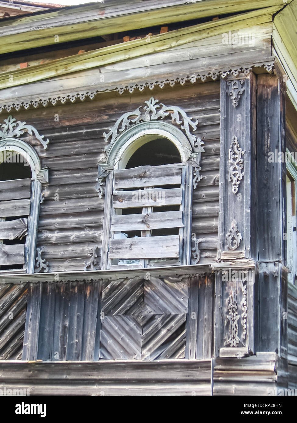 Plinths of windows of wooden houses. Ancient style of decoration of ...