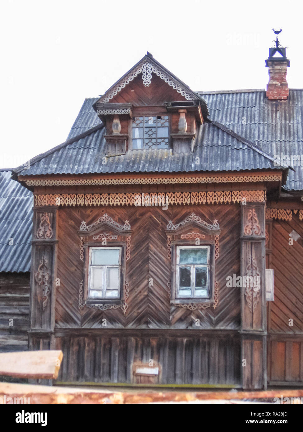 Plinths of windows of wooden houses. Ancient style of decoration of ...