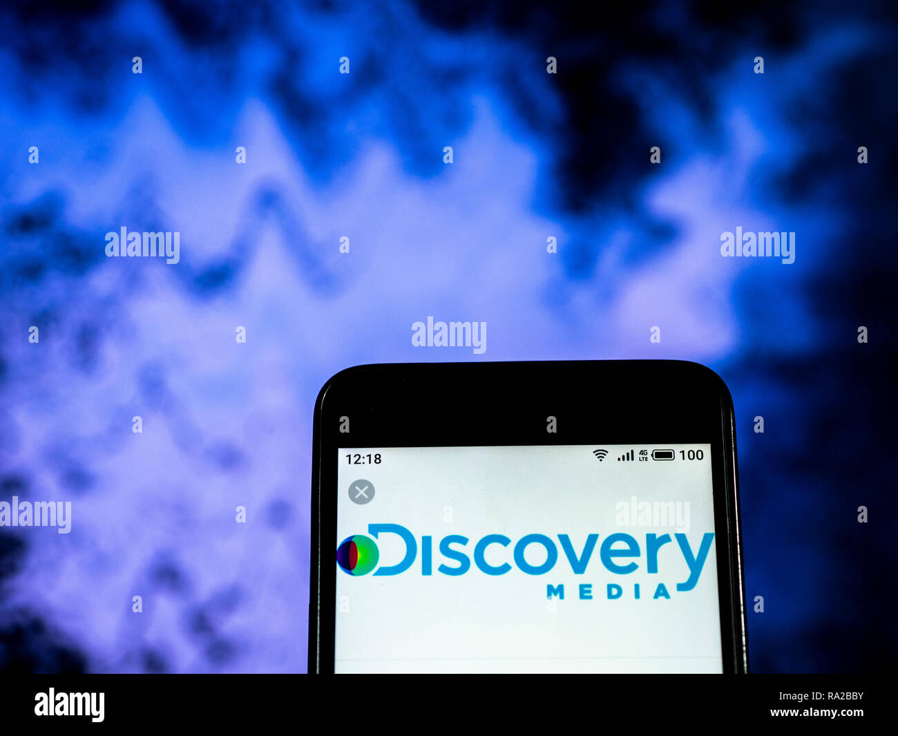 Discovery Media logo seen displayed on smart phone Stock Photo - Alamy