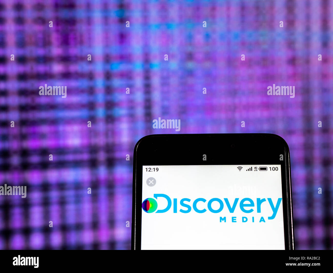 Discovery Media logo seen displayed on smart phone Stock Photo - Alamy
