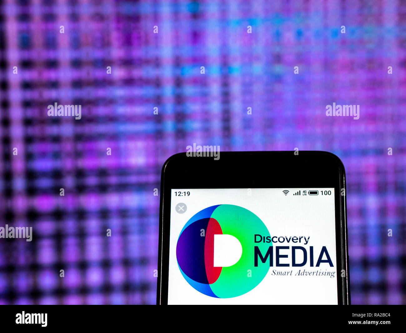 Discovery Media logo seen displayed on smart phone Stock Photo - Alamy