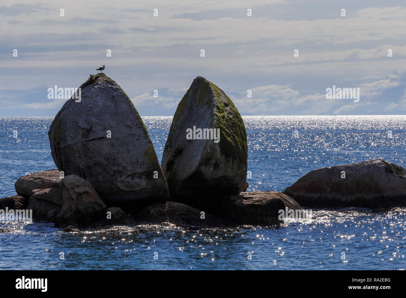 Glinting rock in the sea hi-res stock photography and images - Alamy