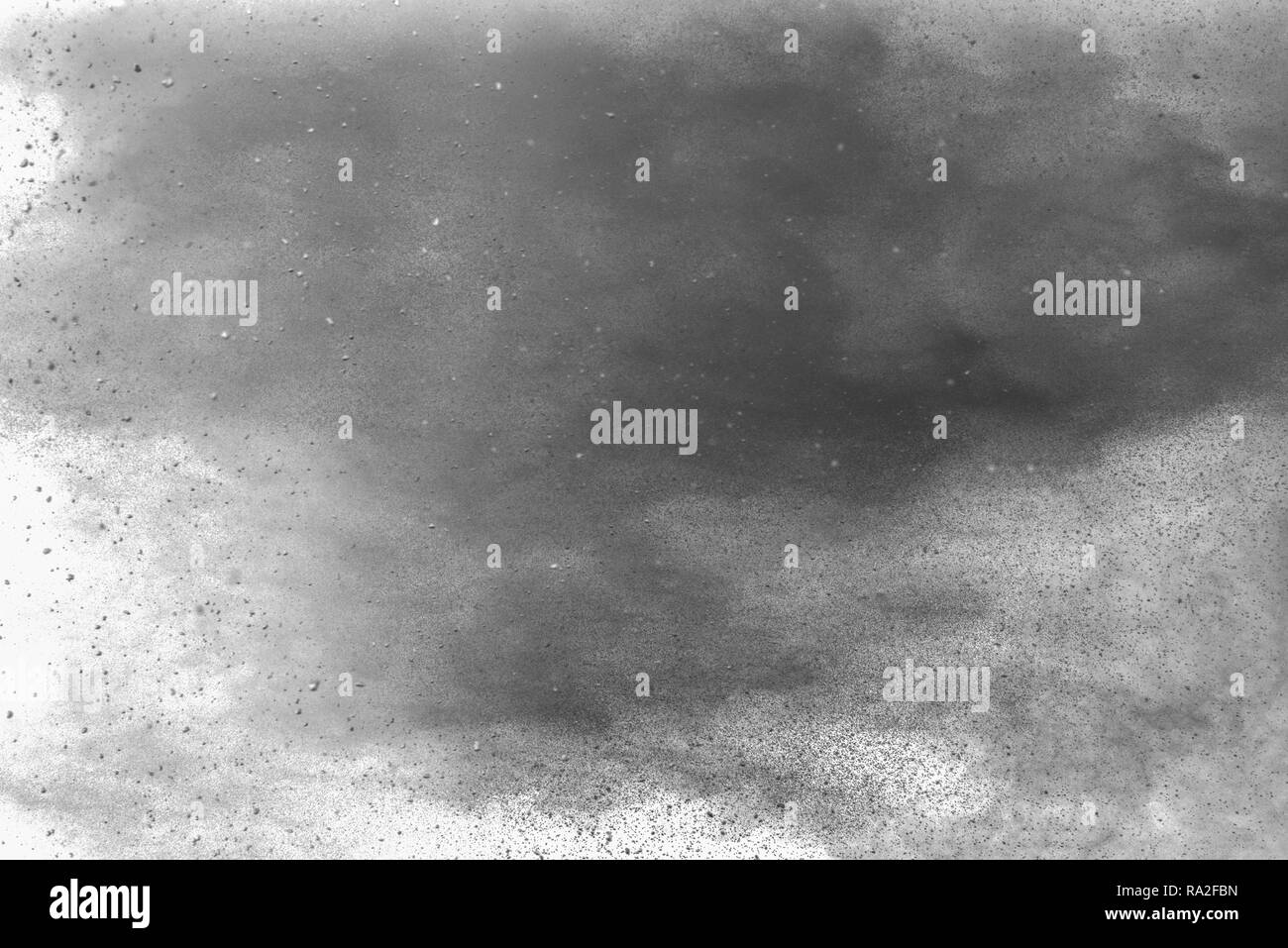 Black particles splatter on white background. Black powder dust ...