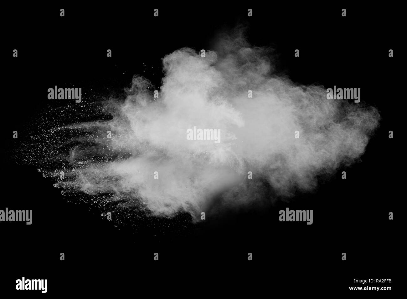 Bizarre forms of white powder explosion cloud against black background ...
