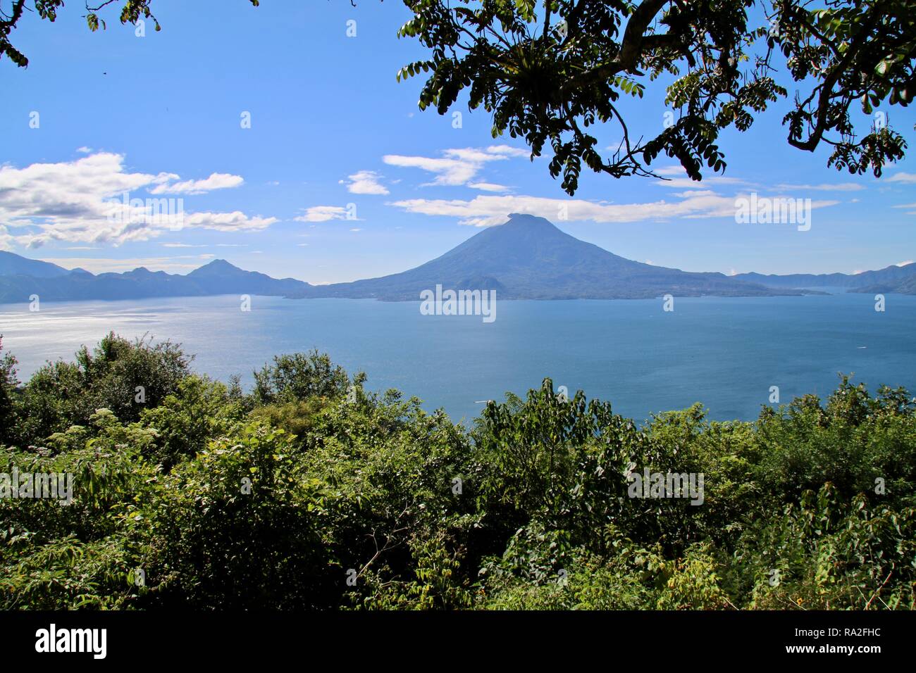 A scenic view over Lake Atitlan from a mountainside lookout Stock Photo ...