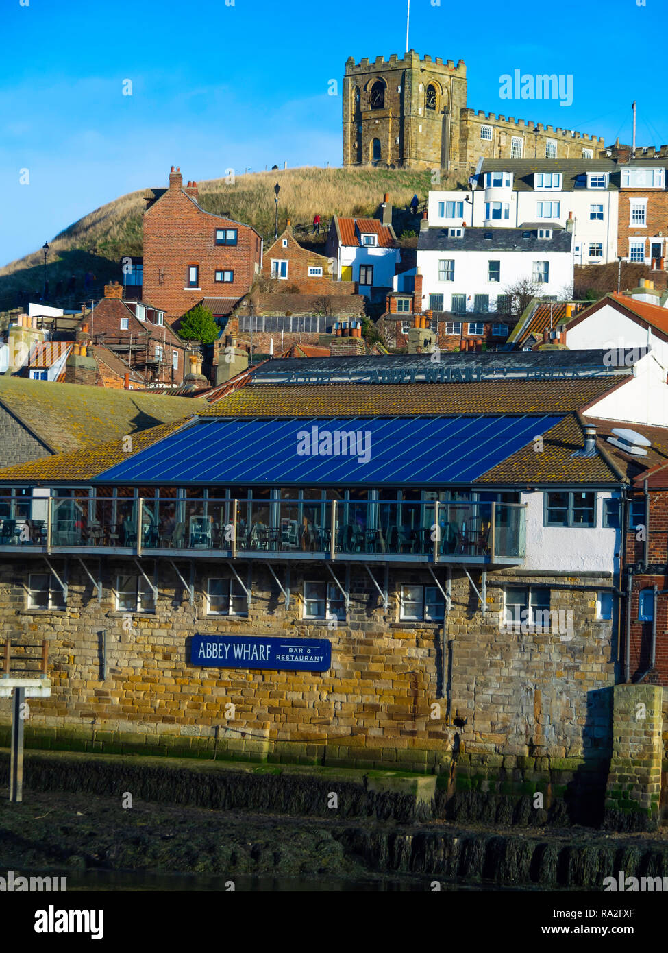 Abbey Wharf fish restaurant seen from across the river Esk Whitby ...