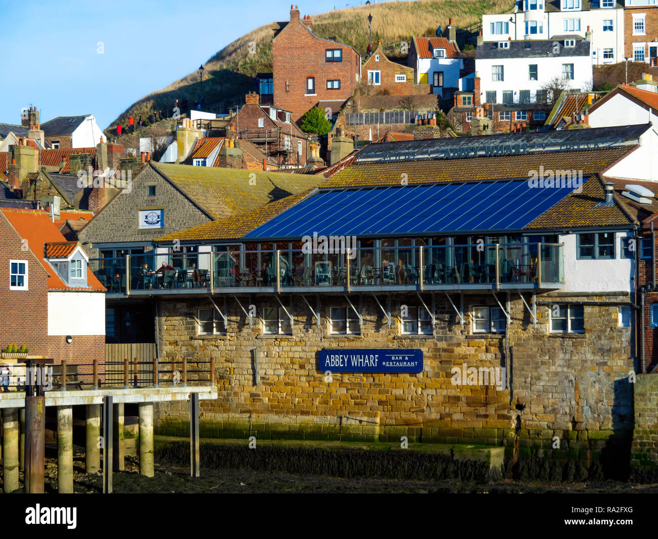 Abbey Wharf fish restaurant seen from across the river Esk Whitby ...