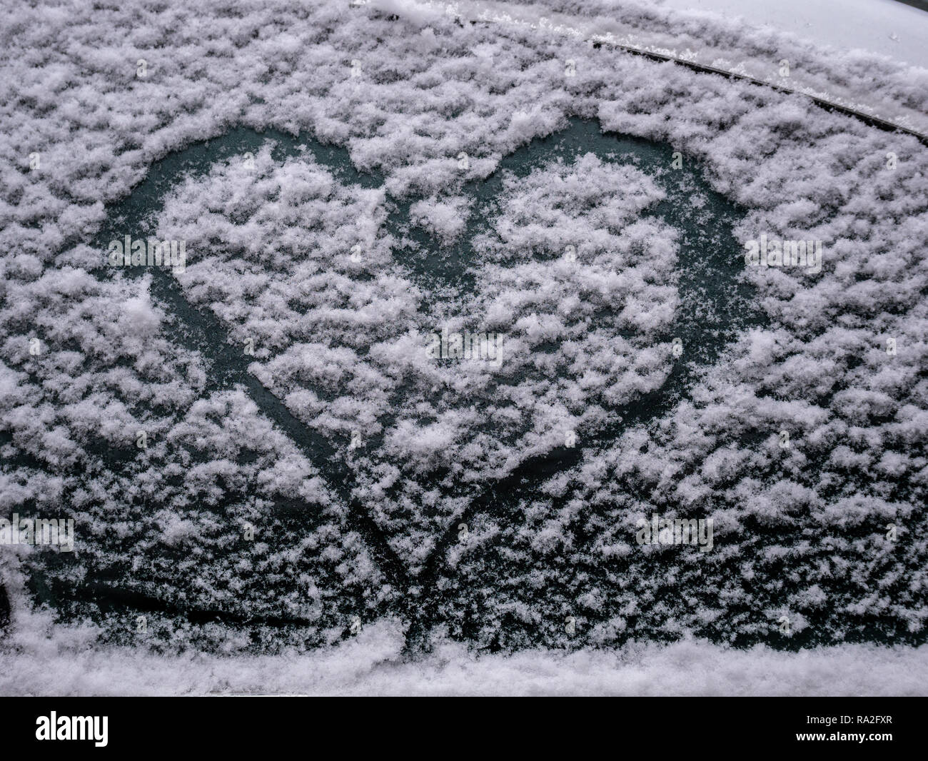 Image of snow heart at the window of a car in the winter Stock Photo ...