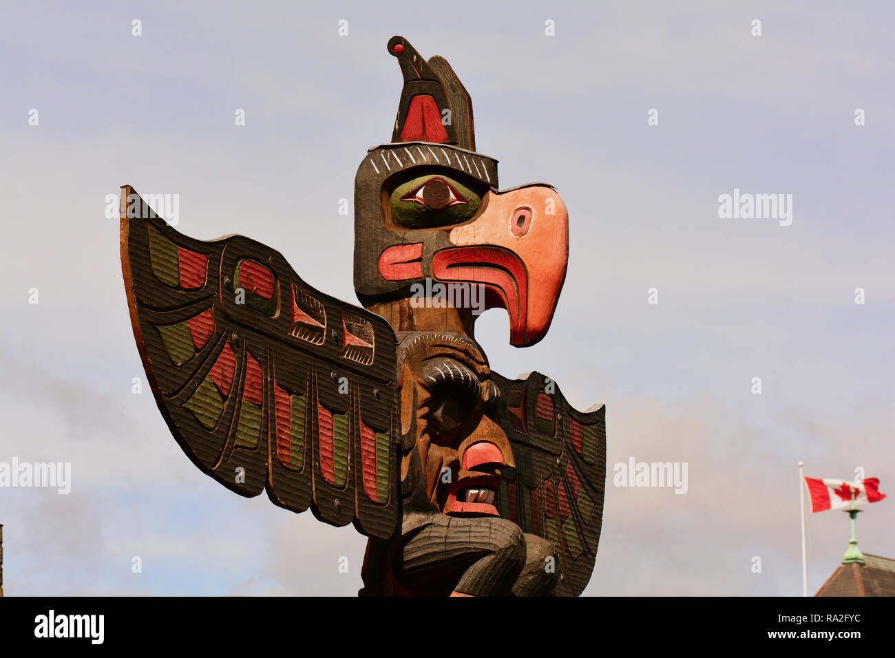 First Nations totem and artwork on display at Thunderbird Park in ...