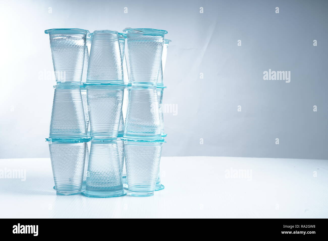 a Stack of Plastic Glass Mineral water Stock Photo - Alamy