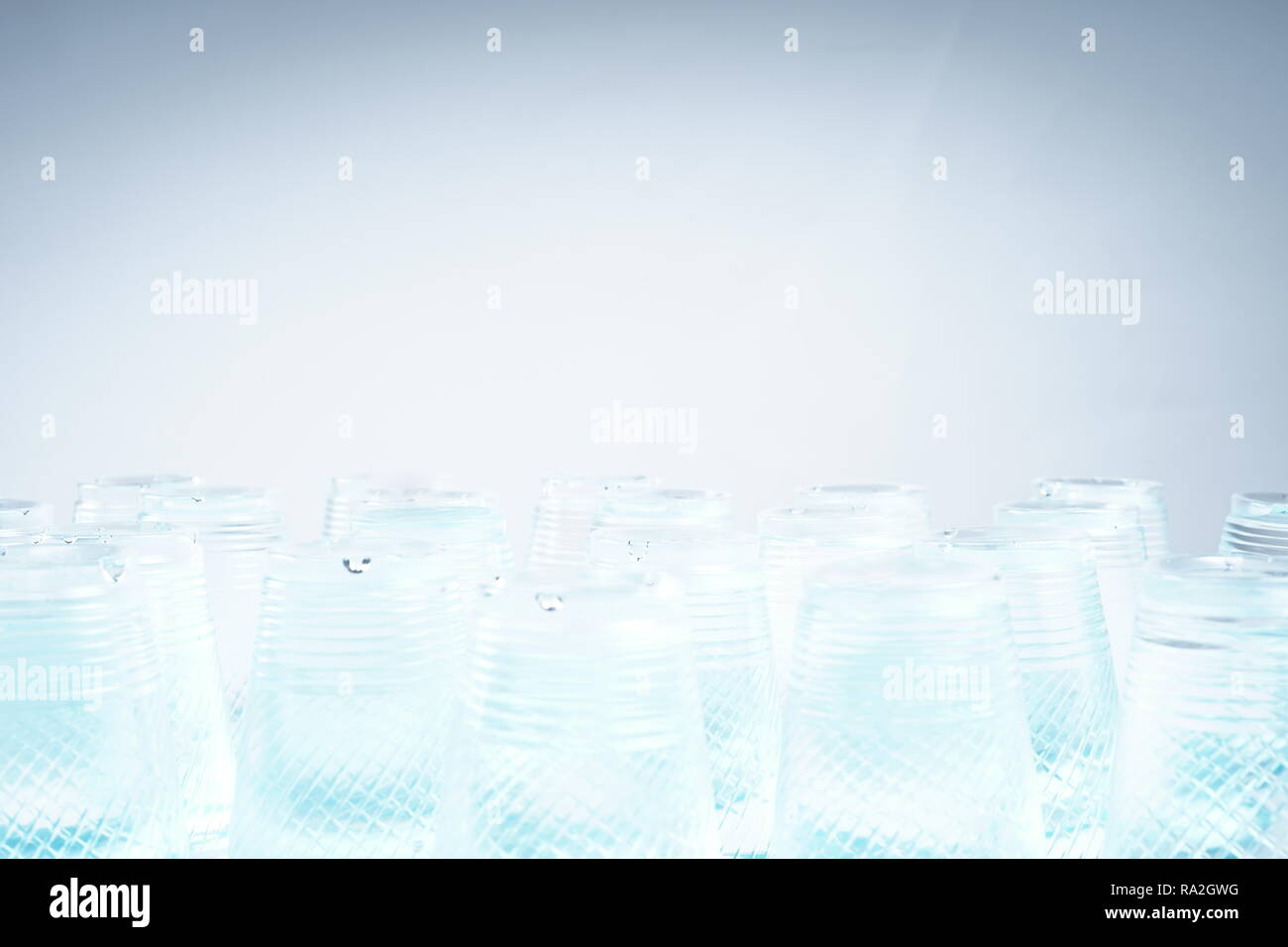 a stack plastic glass of Mineral water on white background Stock Photo ...