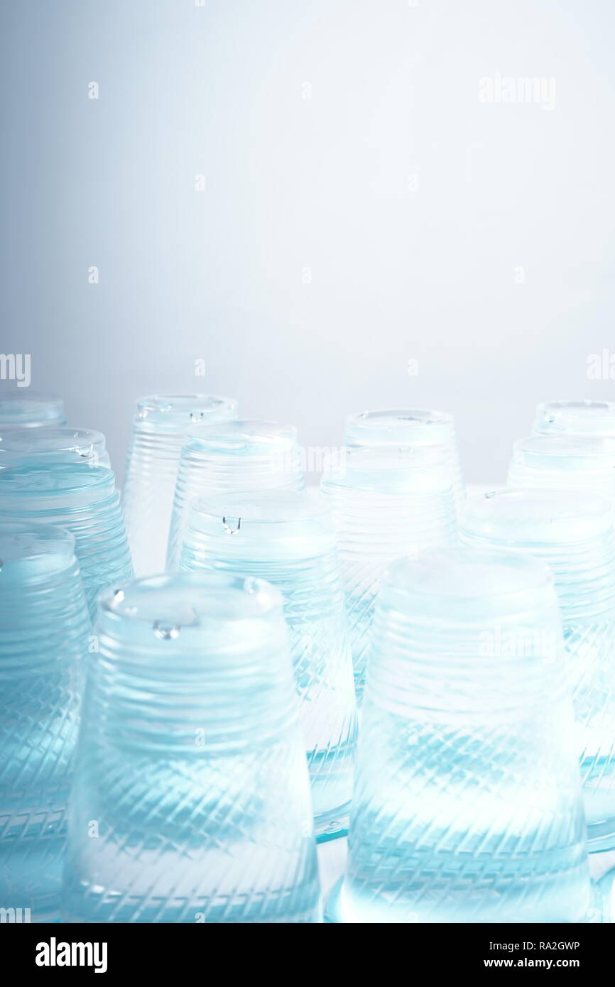 a stack plastic glass of Mineral water on white background Stock Photo ...