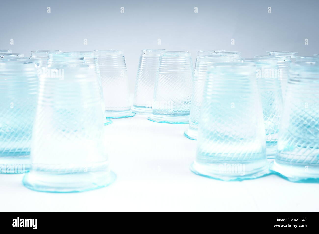 a stack plastic glass of Mineral water on white background Stock Photo ...