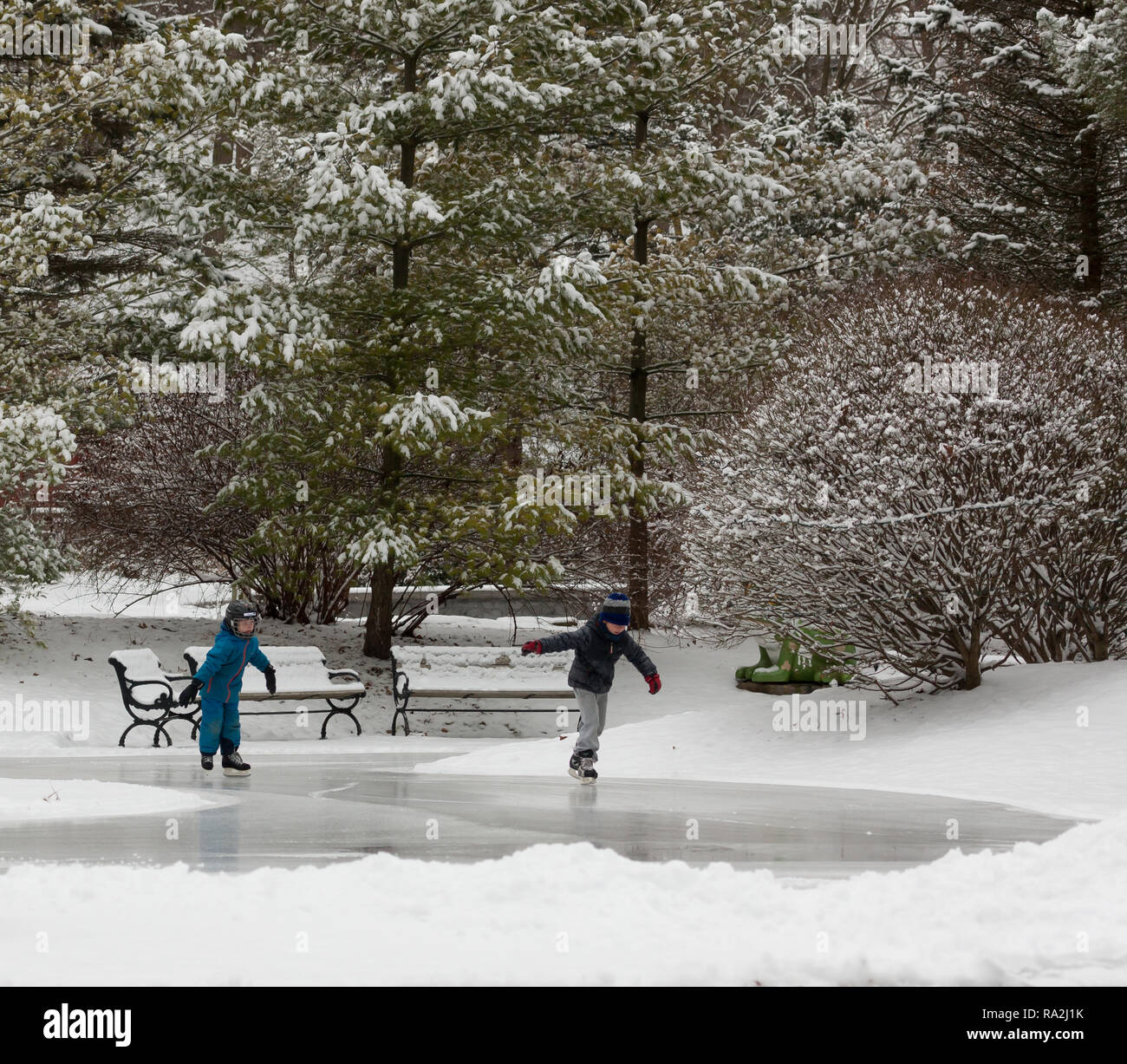 Young children skate on the outside skating rink inside Storybook ...