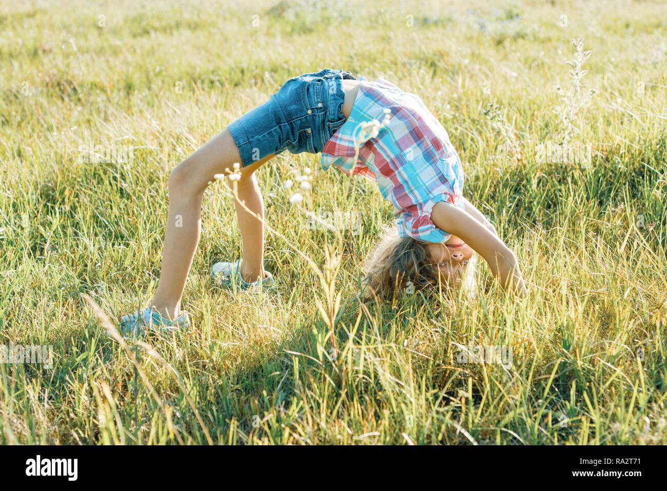Headstand kid hi-res stock photography and images - Alamy