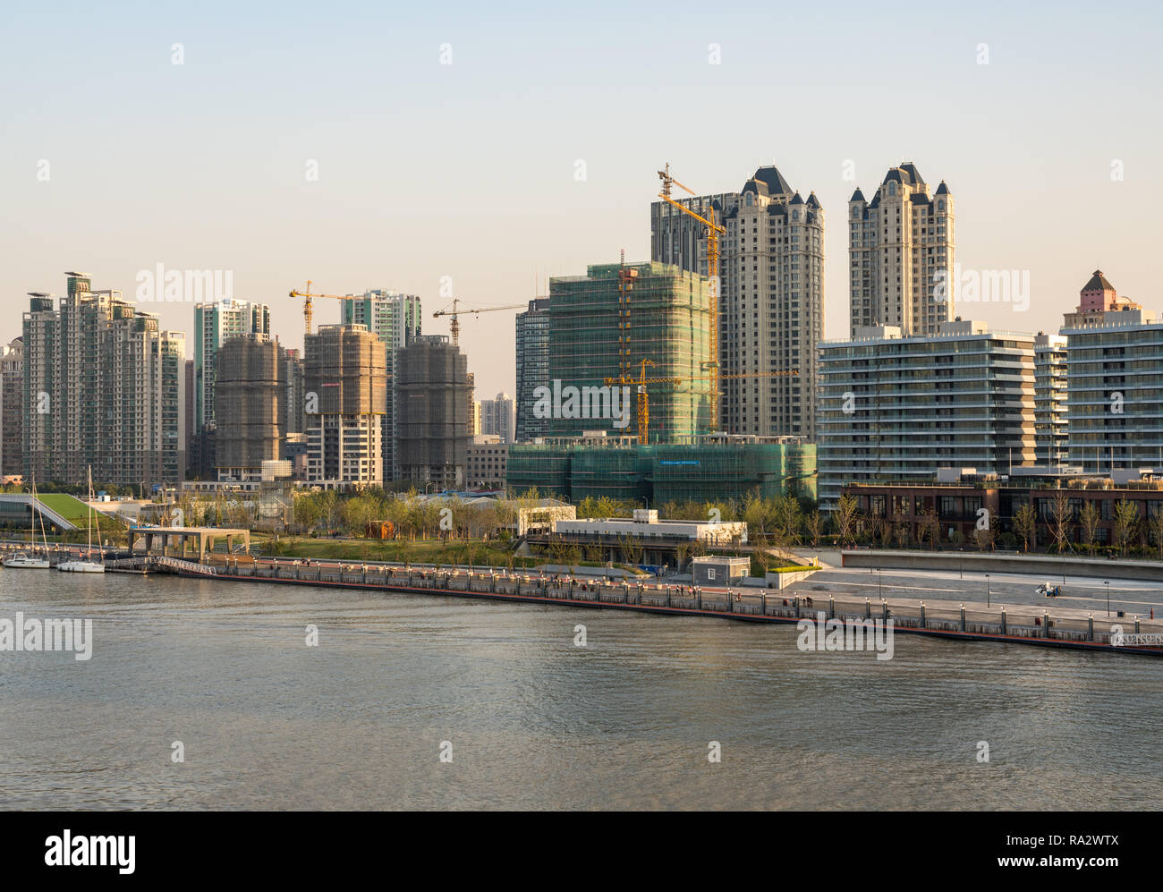 New apartments and riverside development in Shanghai Stock Photo - Alamy