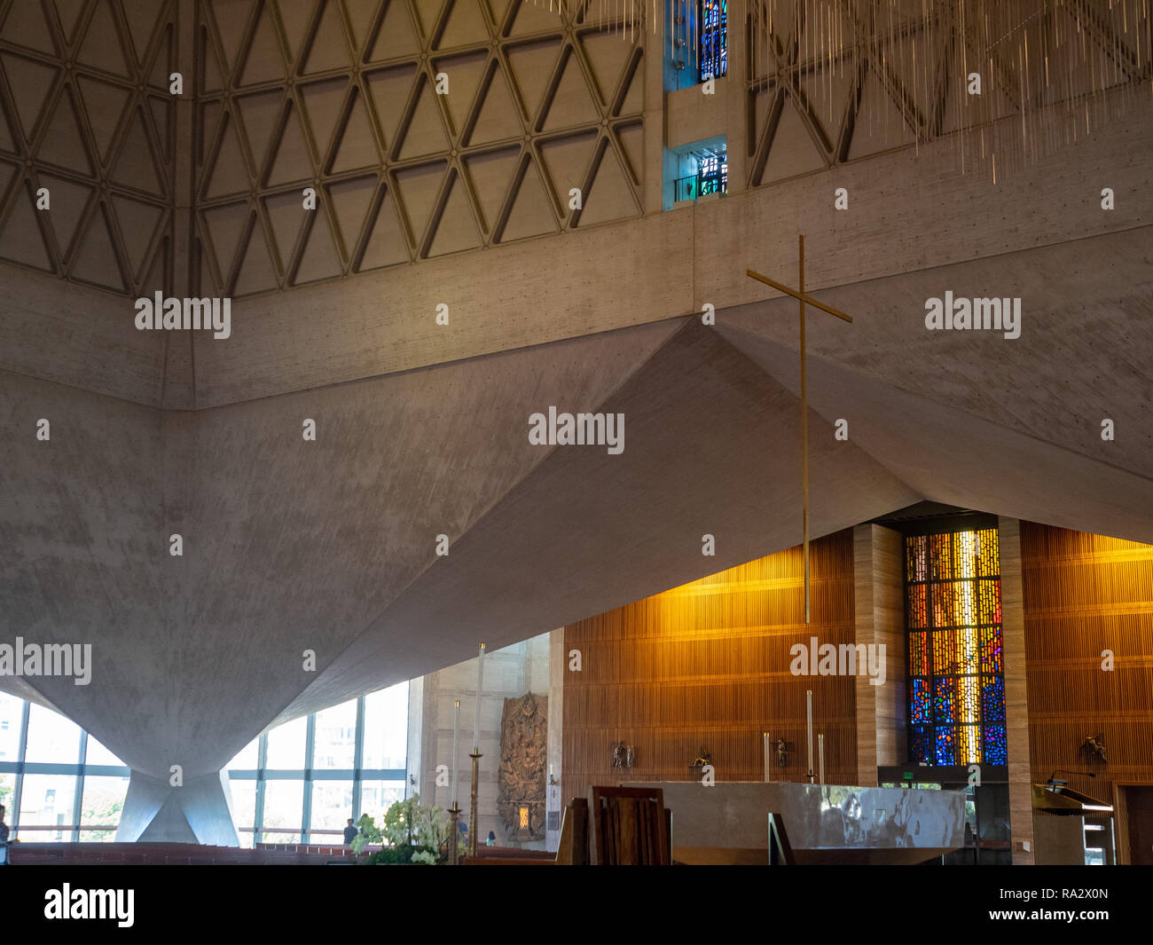 Central cross crucifix hanging and stained glass at Cathedral Of Saint ...
