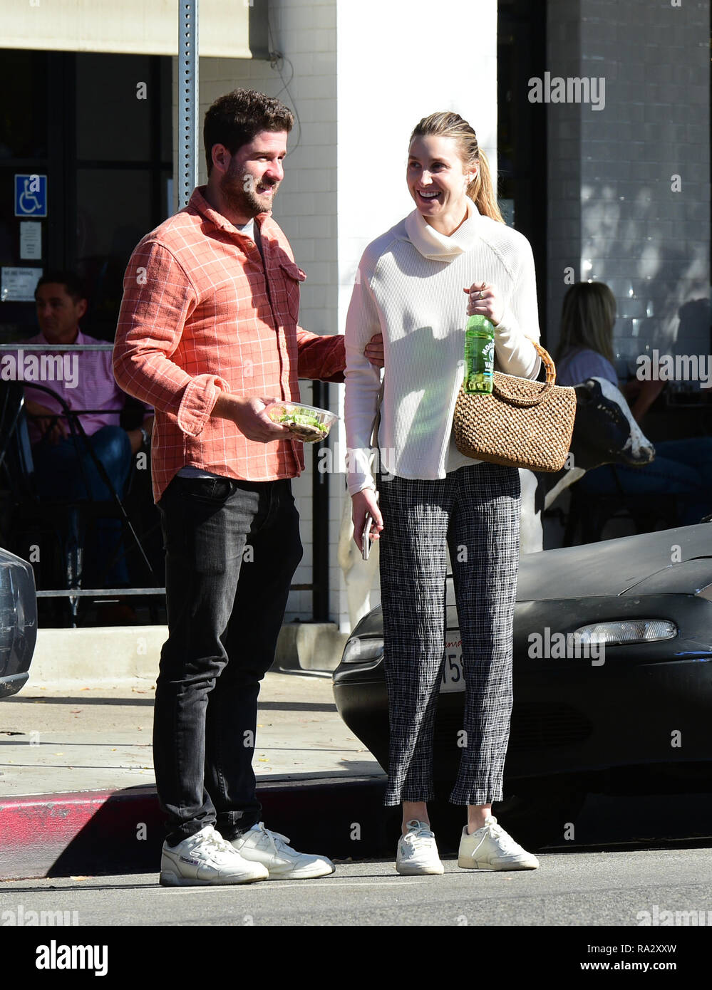 Whitney Port and husband Tim Rosenman are all smiles during a lunch ...