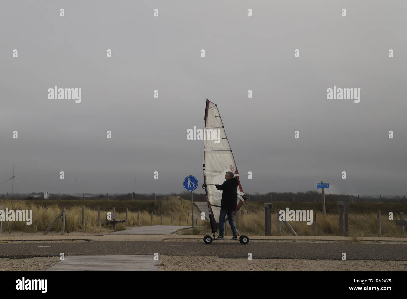 Windsurfing on wheels, on a skateboard Stock Photo - Alamy
