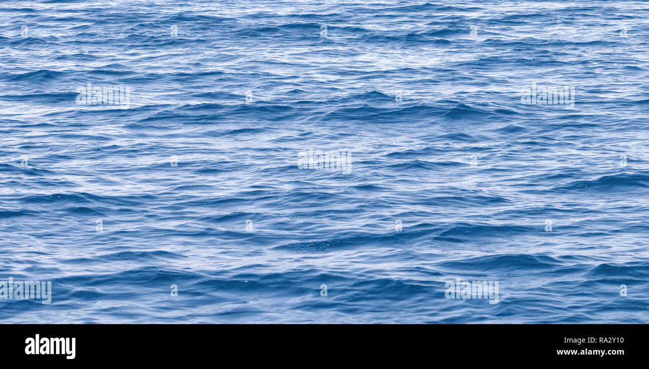 Ocean water surface background Stock Photo - Alamy