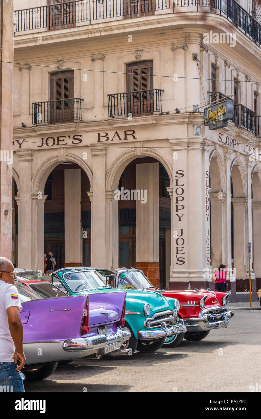 classic 1950s American cars parked outside Sloppy Joe's bar in Havana ...
