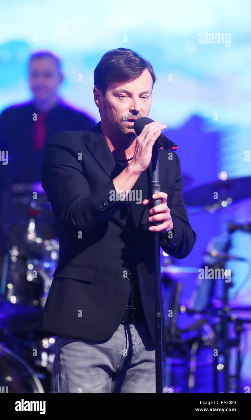 Linz, Austria. 30th Dec, 2018. Singer Florian Ast performs during the ...