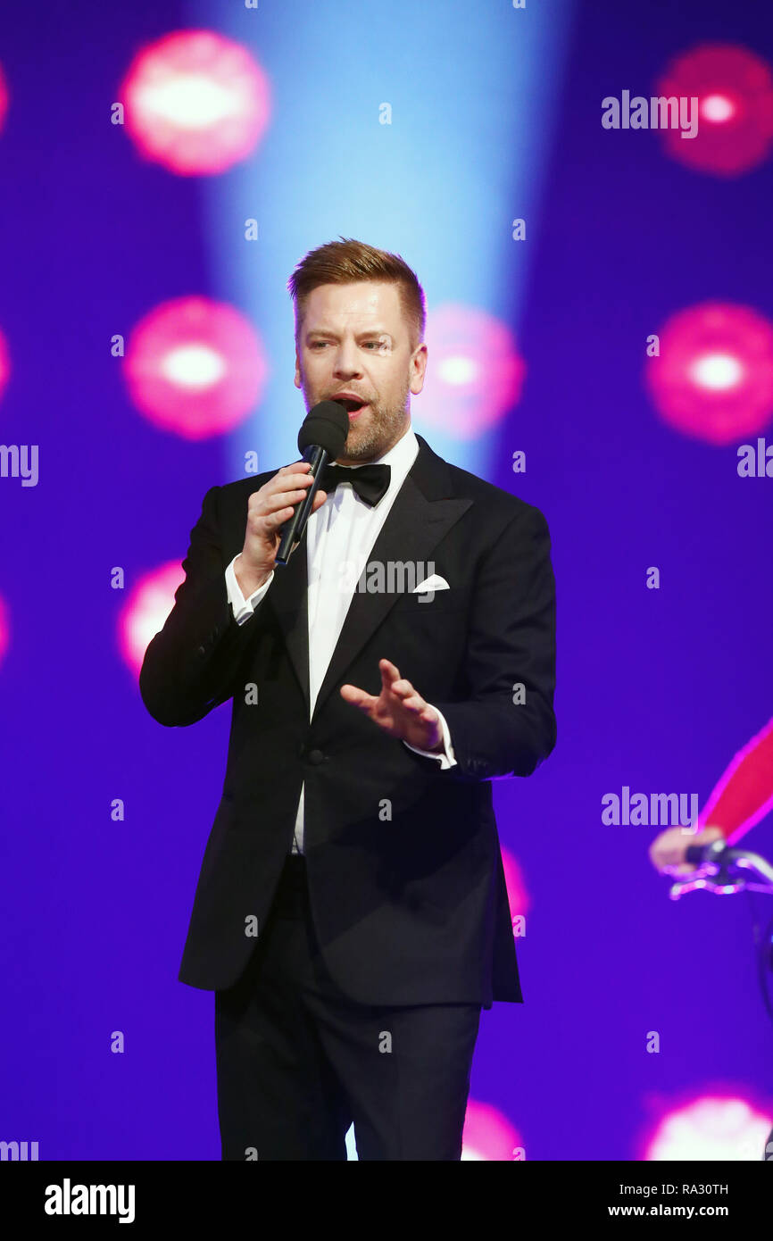 Linz, Austria. 30th Dec, 2018. Singer Tom Gaebel performs during the ...