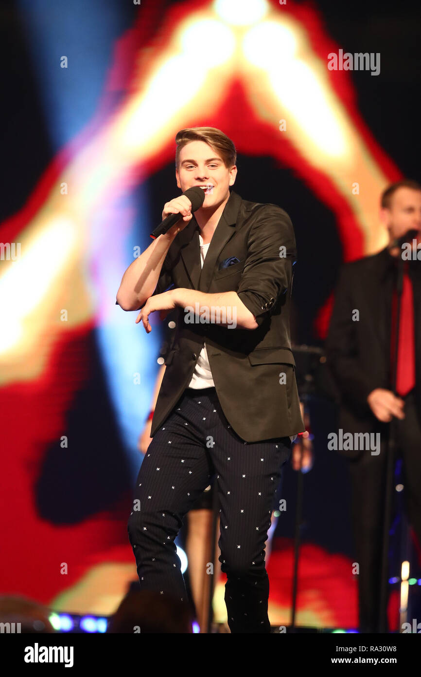 Linz, Austria. 30th Dec, 2018. Singer Vincent Gross performs during the ...