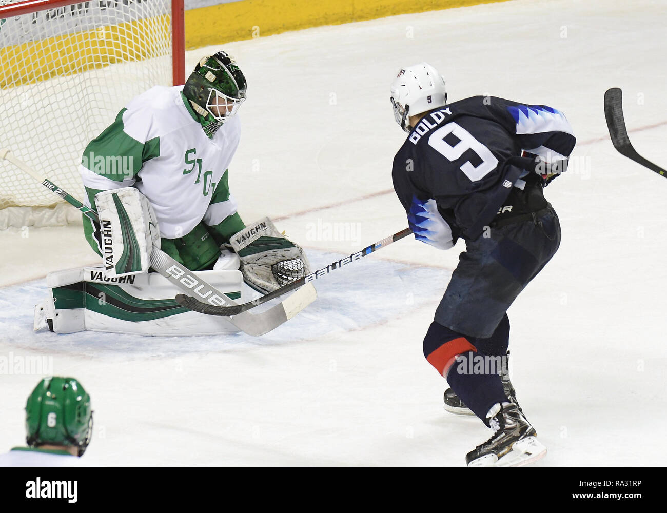 December 29, 2018 North Dakota Fighting Hawks goaltender Peter Thome (1) stops a US National ...