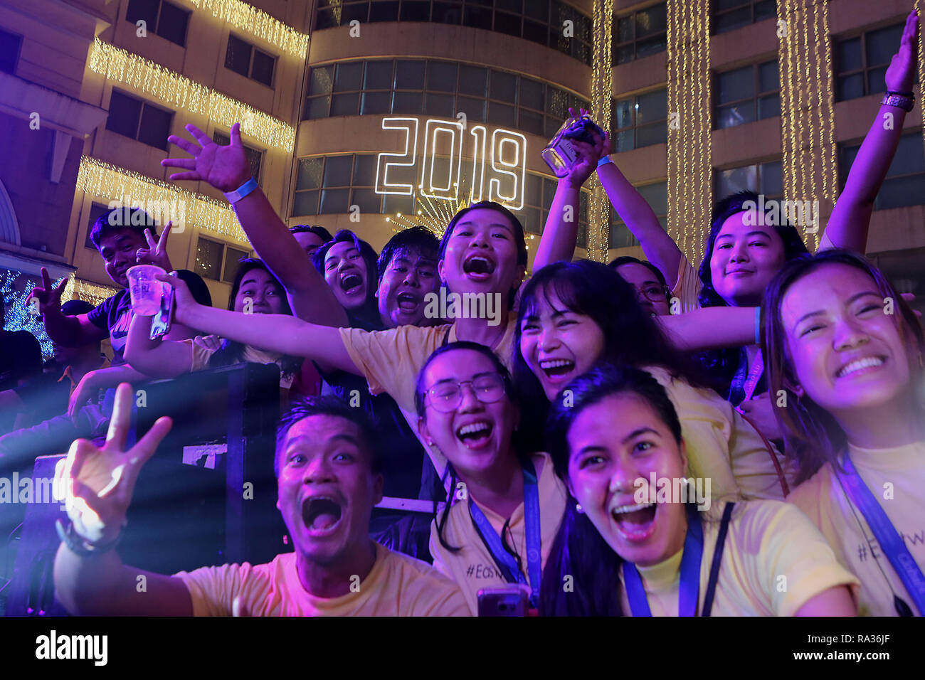 Quezon City, The Philippines. 1st Jan, 2019. Revelers cheer during a ...