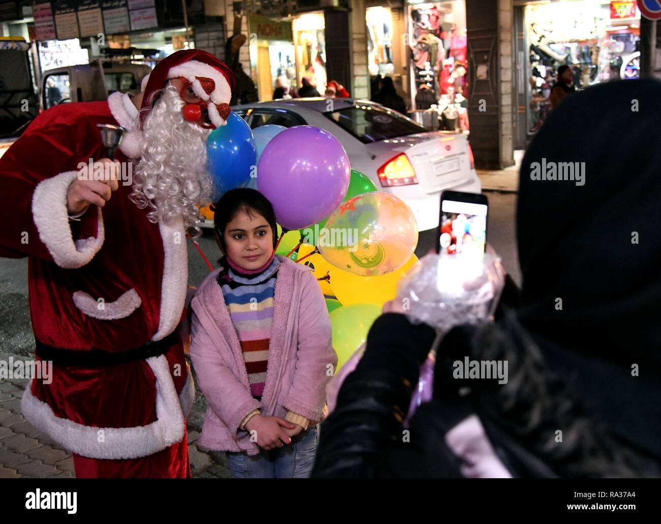 Santa claus poses for photos hi-res stock photography and images - Alamy