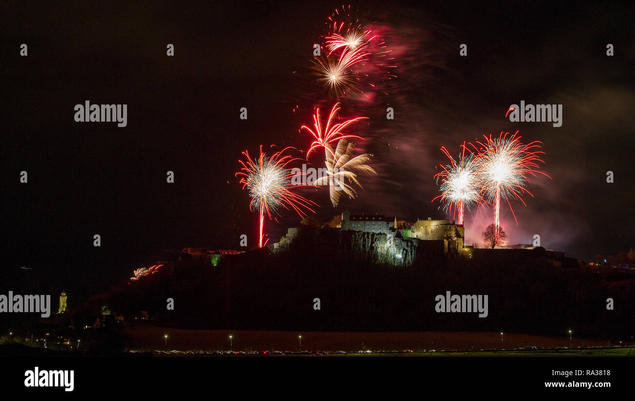 Red fireworks starburst new year celebration stirling castle hi-res ...