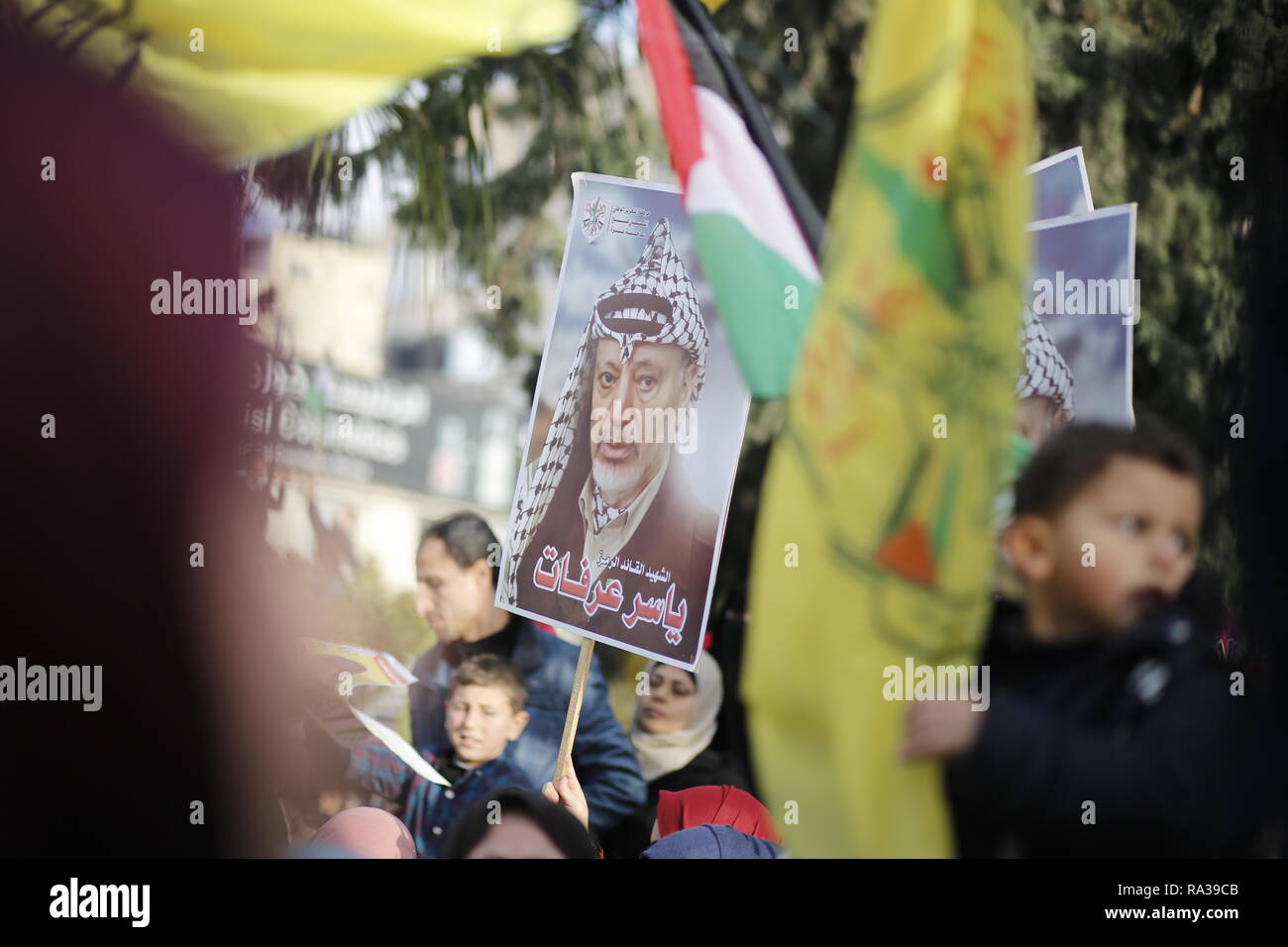 A Palestinian seen with Yasser Arafat portrait during protest ...