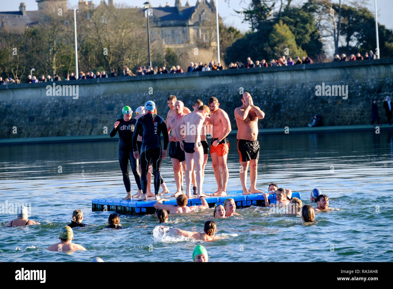 Clevedon, Somerset, UK. 1st Jan 2019. A bracing dip in the Marine Lake ...