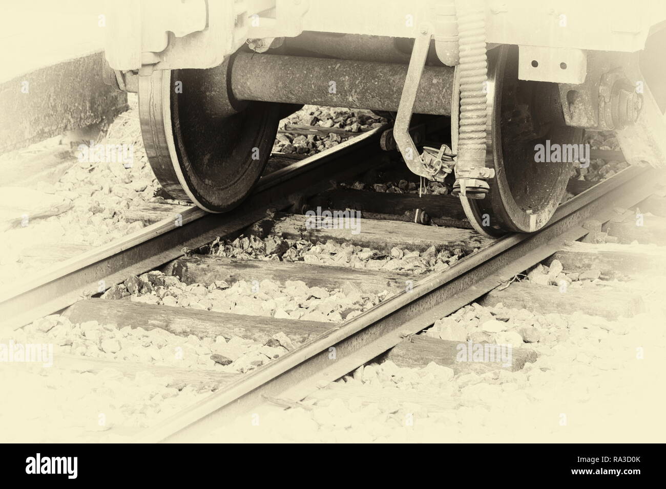 closeup wheel of a train on the railroad at the station. with image ...