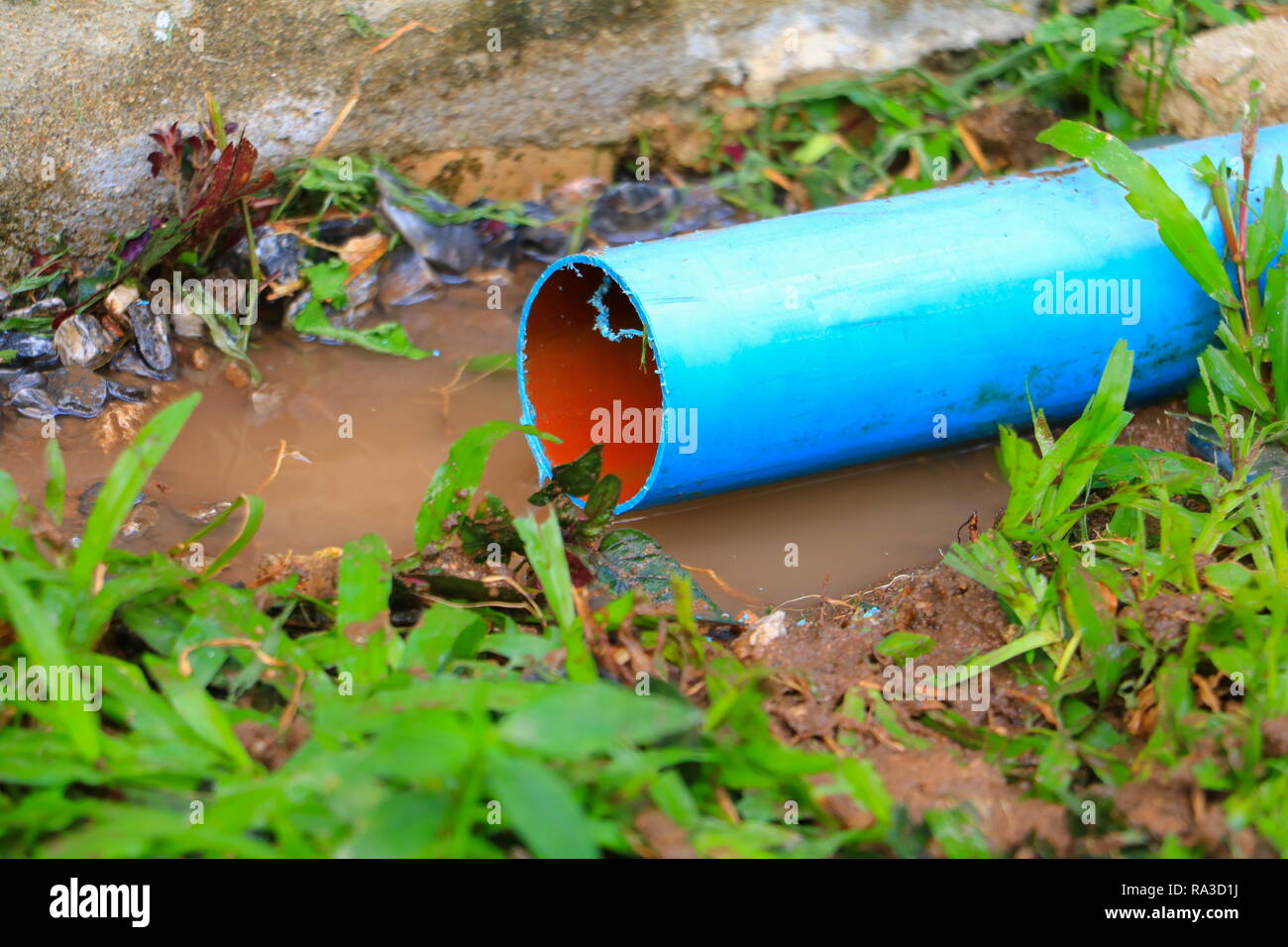 PVC plastic pipe repair cut outside a building site Stock Photo - Alamy