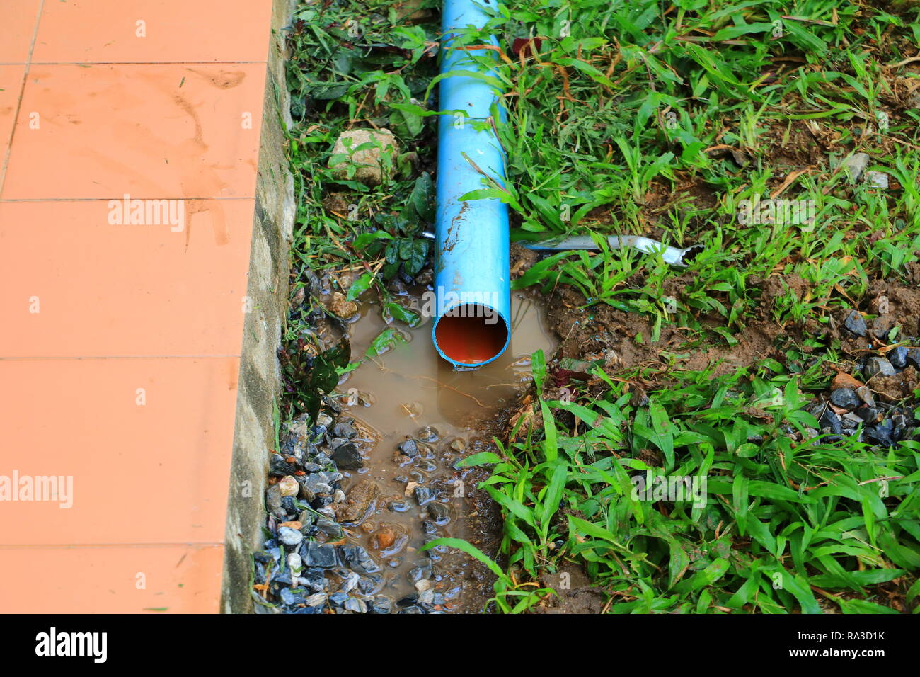 PVC plastic pipe repair cut outside a building site Stock Photo - Alamy