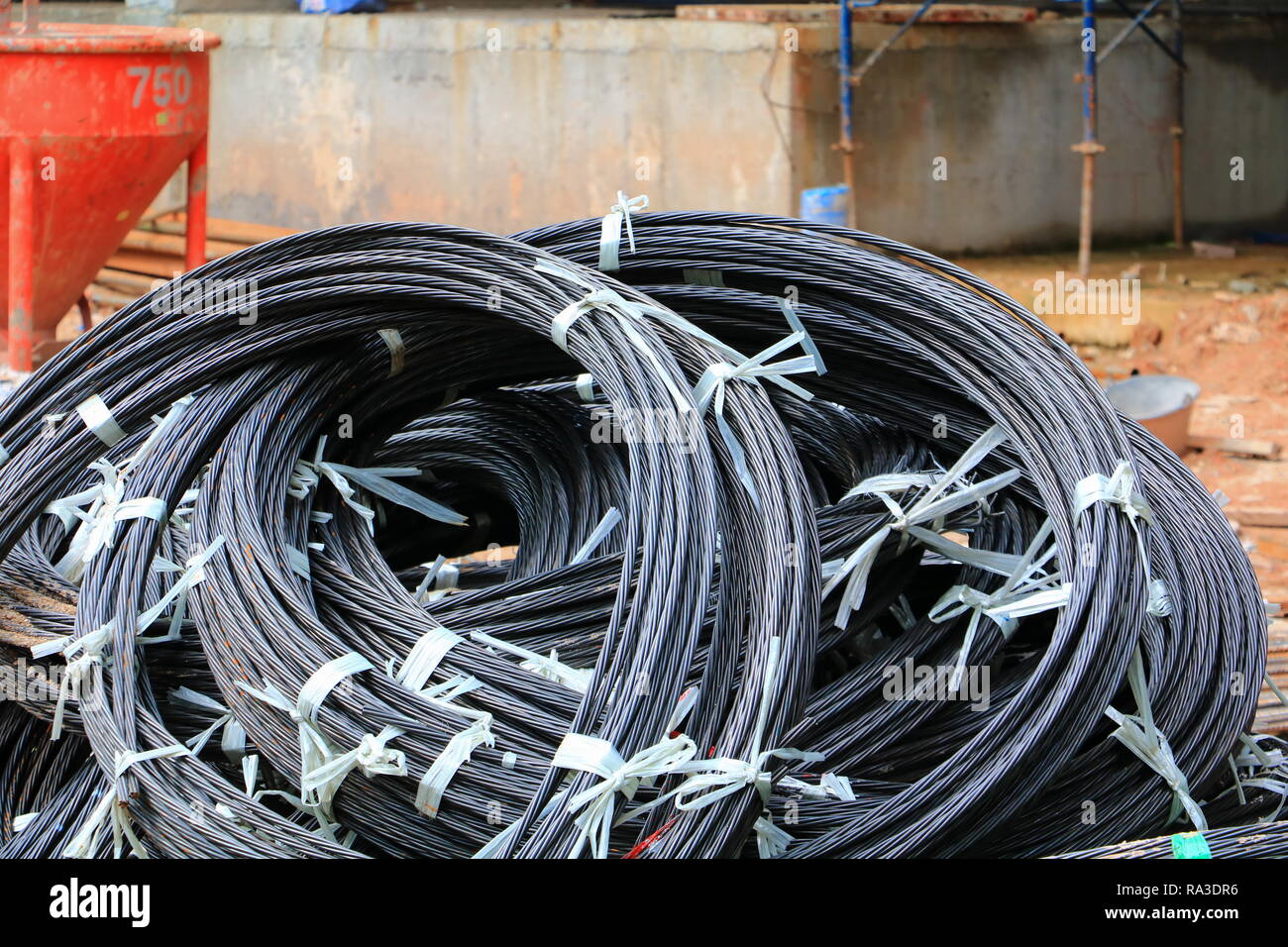 wire rod or coil - sling in a construction site on the ground select ...