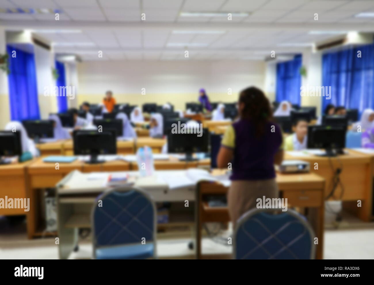 focus blur, the student with teacher learning business technology ...