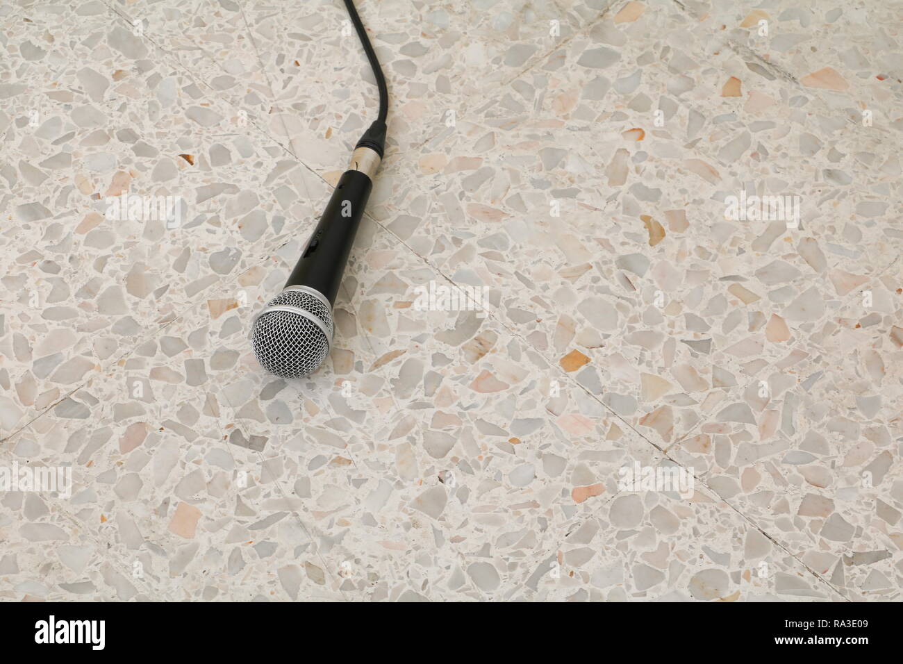 Microphone dynamic on floor marble polished stone background Stock ...