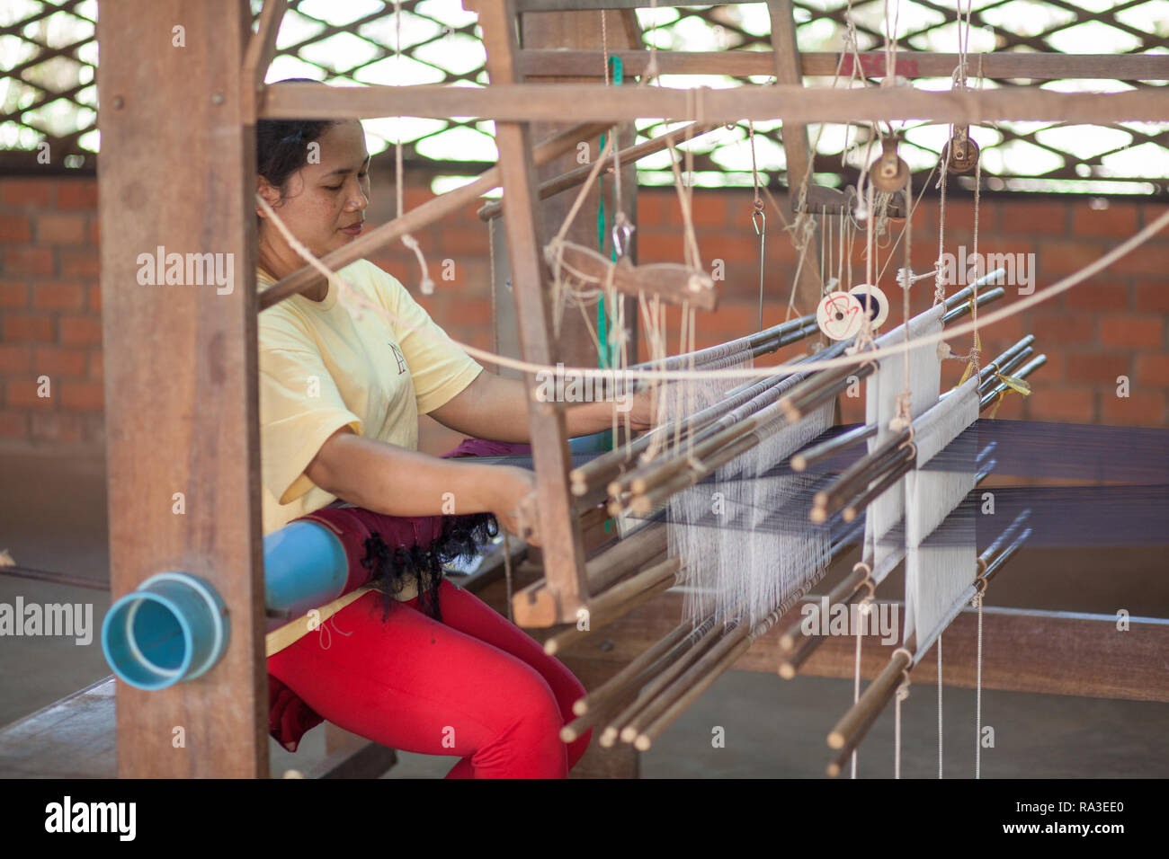 Ladies are working at silk clothes production at siam reap cambodia ...