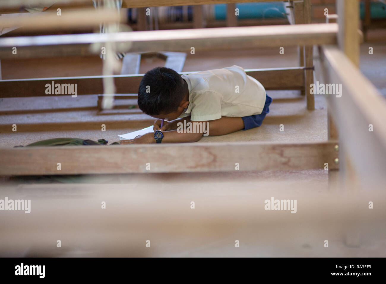 Poor kid studying hi-res stock photography and images - Alamy