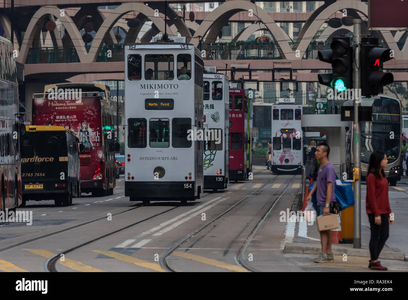 Trams line up on their route East through Causeway Bay towards North ...
