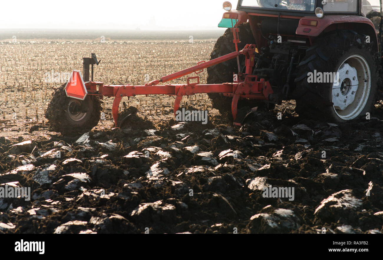 Farmer plowing stubble fields Stock Photo - Alamy