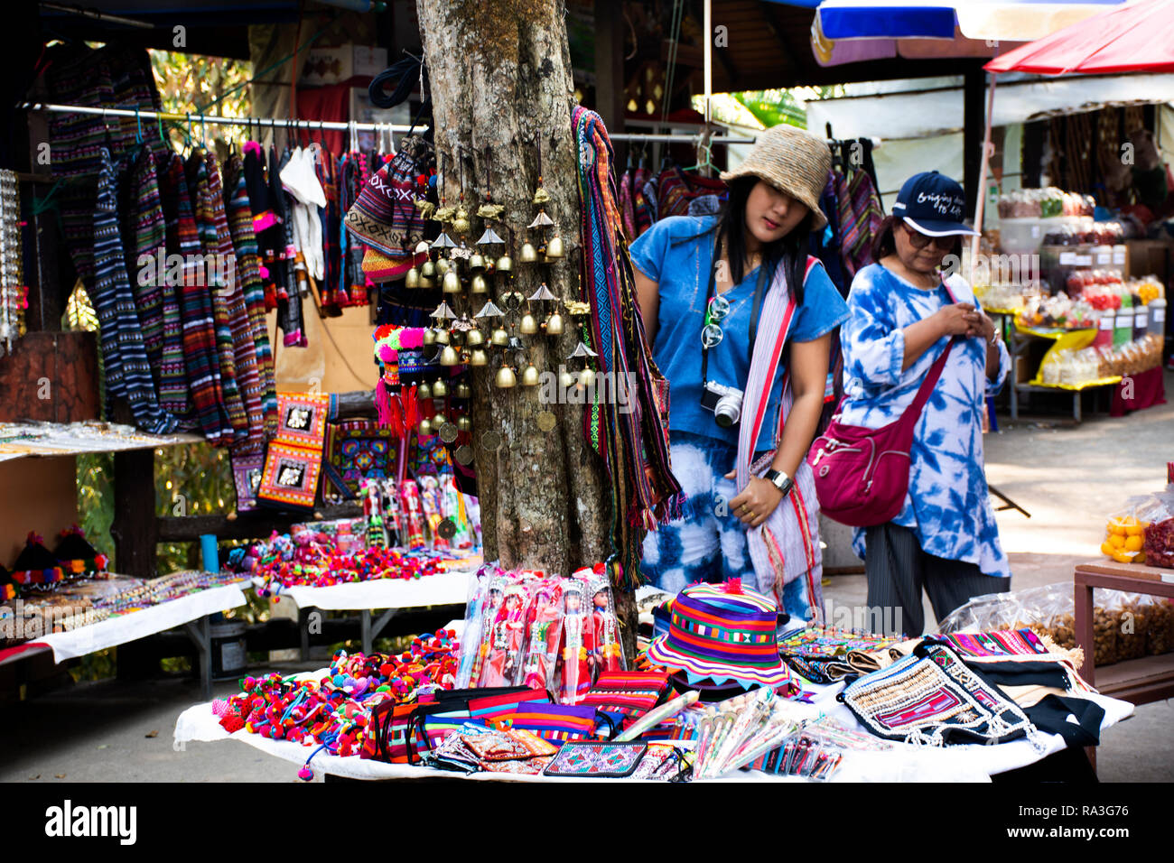 Asian thai people travel and shopping product and food from local shop ...